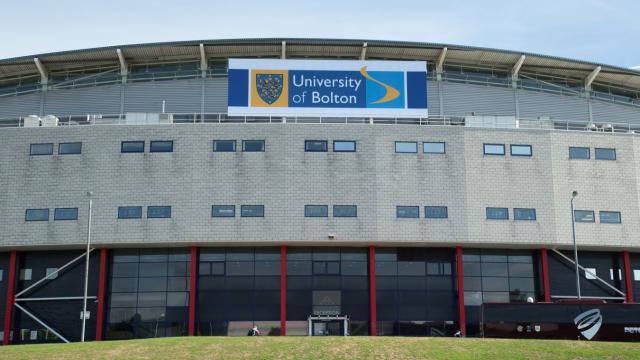 Club marks first game at newly-named University of Bolton Stadium ...